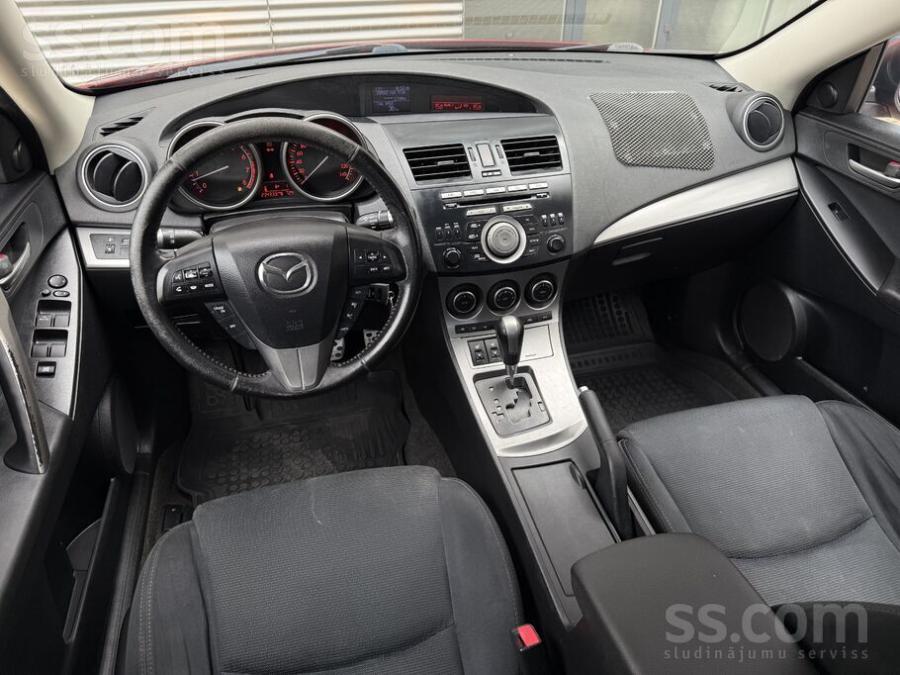 Red Mazda 3 2010 in Riga, with an engine capacity of 2.00 L and mileage of 234 thousand km for 1990 €, photo 6 on AUTOMOTO.COM.LV