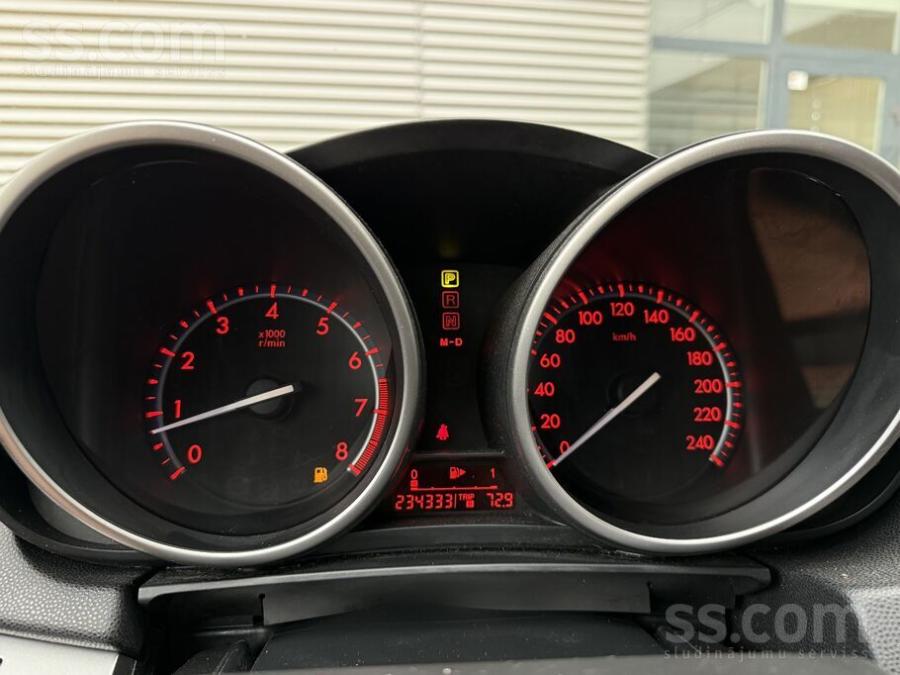 Red Mazda 3 2010 in Riga, with an engine capacity of 2.00 L and mileage of 234 thousand km for 1990 €, photo 7 on AUTOMOTO.COM.LV