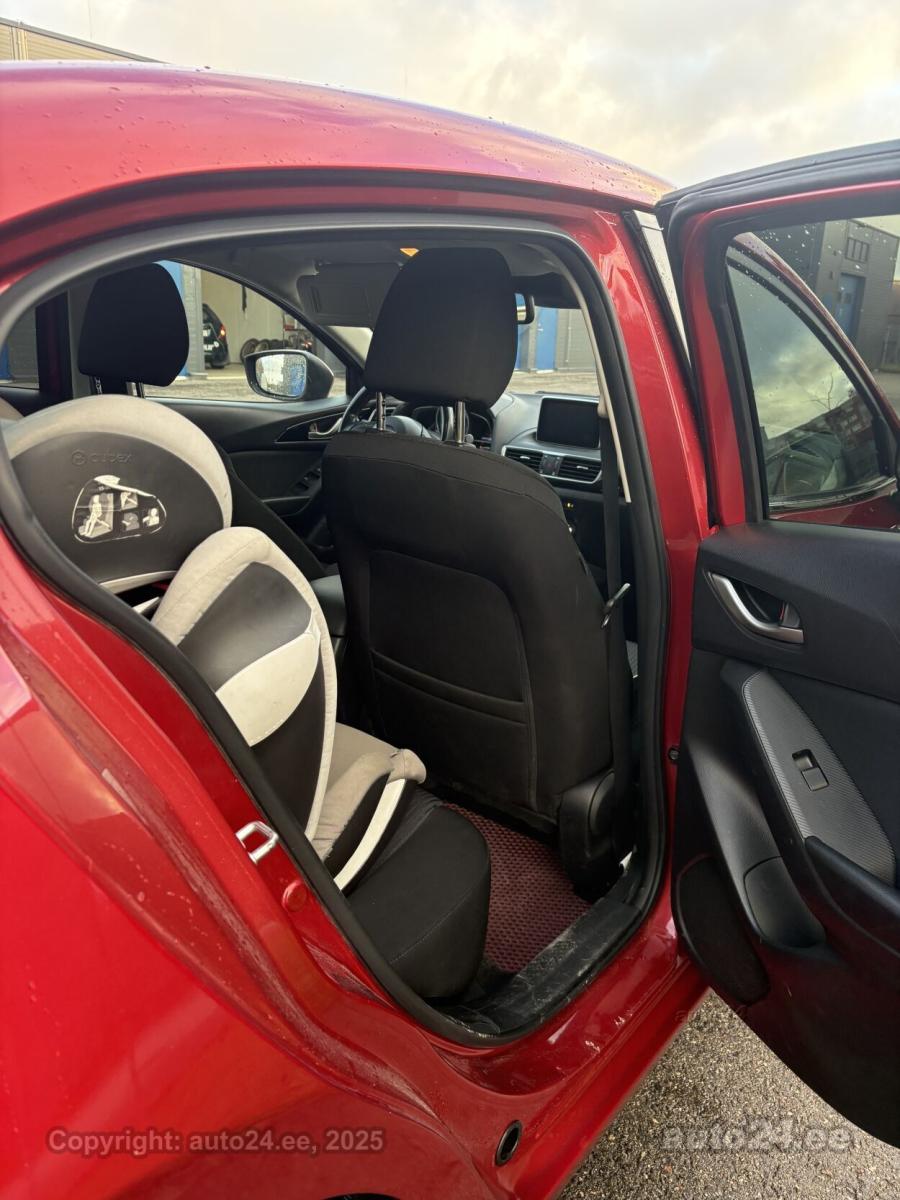 Red Mazda 3 2015 in Kuressaare, with an engine capacity of 2.00 L and mileage of 153 thousand km for 8900 €, photo 13 on AUTOMOTO.COM.LV