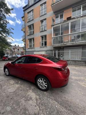 Red Mazda 3 2015 in Vilnius, with an engine capacity of 2.00 L and mileage of 90 thousand km for 7900 €, photo 8 on AUTOMOTO.COM.LV