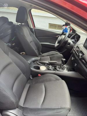 Red Mazda 3 2015 in Vilnius, with an engine capacity of 2.00 L and mileage of 90 thousand km for 7900 €, photo 11 on AUTOMOTO.COM.LV