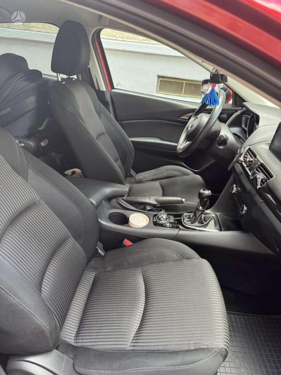 Red Mazda 3 2015 in Vilnius, with an engine capacity of 2.00 L and mileage of 90 thousand km for 7900 €, photo 11 on AUTOMOTO.COM.LV