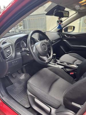 Red Mazda 3 2015 in Vilnius, with an engine capacity of 2.00 L and mileage of 90 thousand km for 7900 €, photo 12 on AUTOMOTO.COM.LV