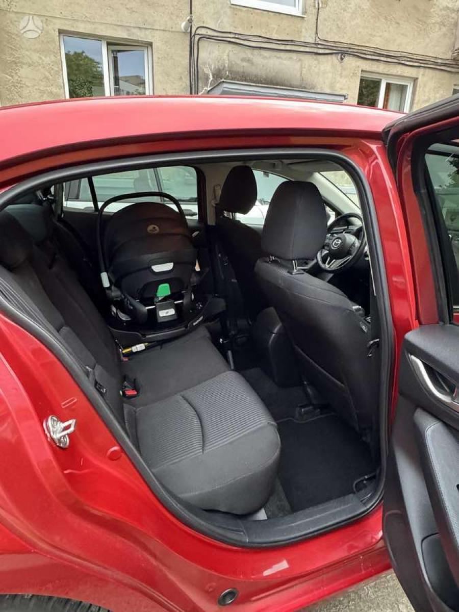 Red Mazda 3 2015 in Vilnius, with an engine capacity of 2.00 L and mileage of 90 thousand km for 7900 €, photo 14 on AUTOMOTO.COM.LV