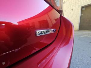 Red Mazda 3 2019 in Vilnius, with an engine capacity of 2.00 L and mileage of 52 thousand km for 23666 €, photo 7 on AUTOMOTO.COM.LV