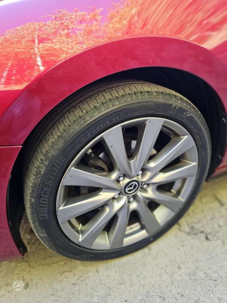 Red Mazda 3 2019 in Vilnius, with an engine capacity of 2.00 L and mileage of 52 thousand km for 23666 €, photo 8 on AUTOMOTO.COM.LV