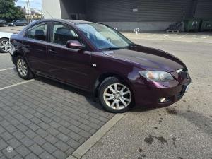 Violet Mazda 3 2007 in Vilnius, with an engine capacity of 1.60 L and mileage of 124 thousand km for 1950 €, photo  on AUTOMOTO.COM.LV