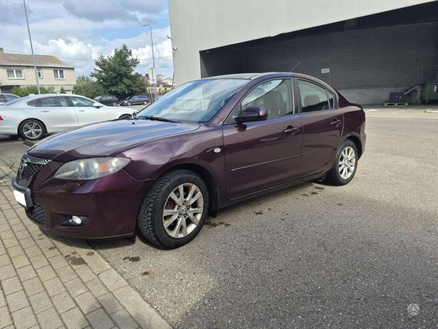 Violet Mazda 3 2007 in Vilnius, with an engine capacity of 1.60 L and mileage of 124 thousand km for 1950 €, photo 3 on AUTOMOTO.COM.LV