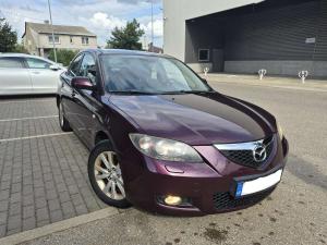 Violet Mazda 3 2007 in Vilnius, with an engine capacity of 1.60 L and mileage of 124 thousand km for 1950 €, photo 6 on AUTOMOTO.COM.LV
