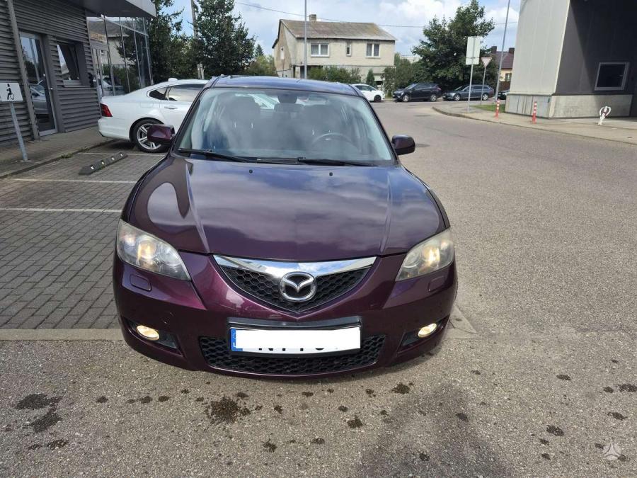 Violet Mazda 3 2007 in Vilnius, with an engine capacity of 1.60 L and mileage of 124 thousand km for 1950 €, photo 7 on AUTOMOTO.COM.LV
