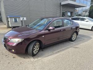 Violet Mazda 3 2007 in Vilnius, with an engine capacity of 1.60 L and mileage of 124 thousand km for 1950 €, photo 8 on AUTOMOTO.COM.LV