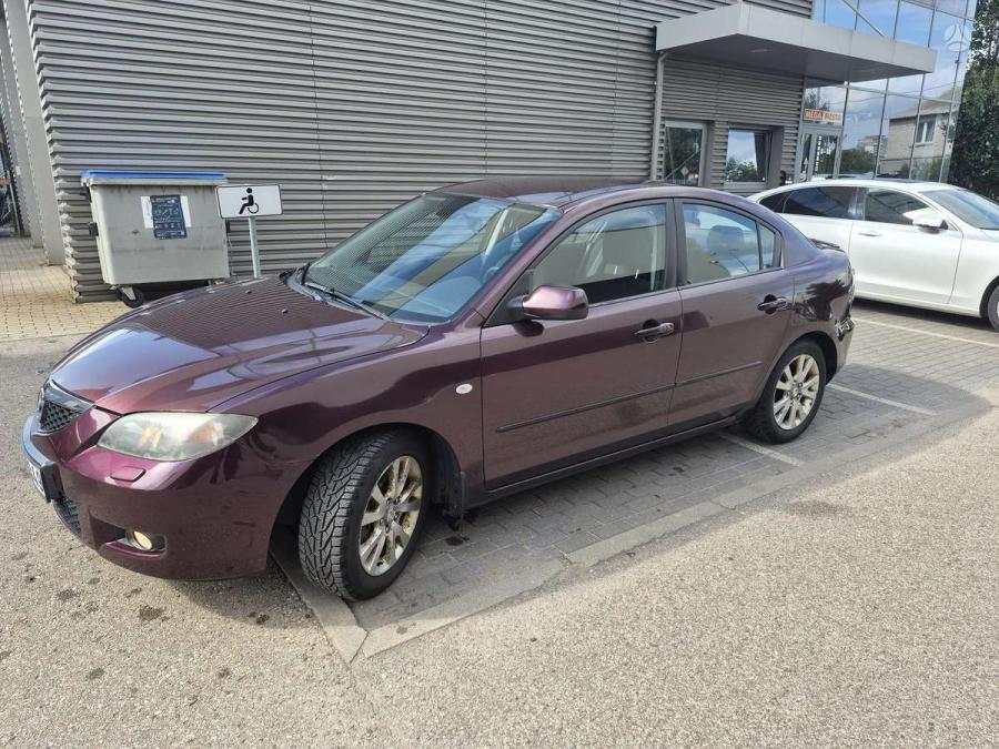 Violet Mazda 3 2007 in Vilnius, with an engine capacity of 1.60 L and mileage of 124 thousand km for 1950 €, photo 8 on AUTOMOTO.COM.LV