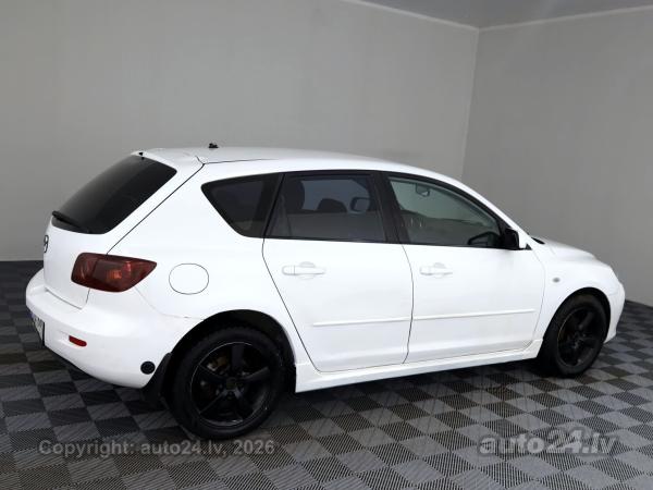 White Mazda 3 2006 in Tallinn, with an engine capacity of 1.60 L and mileage of 215 thousand km for 1599 €, photo 3 on AUTOMOTO.COM.LV