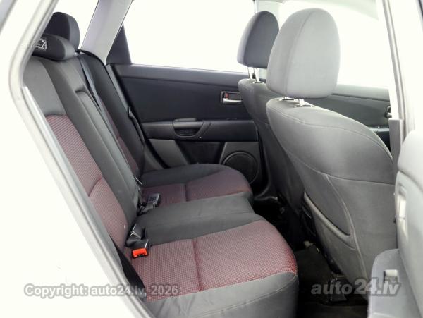 White Mazda 3 2006 in Tallinn, with an engine capacity of 1.60 L and mileage of 215 thousand km for 1599 €, photo 7 on AUTOMOTO.COM.LV