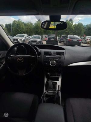 White Mazda 3 2010 in Kaunas, with an engine capacity of 1.56 L and mileage of 315 thousand km for 2400 €, photo 9 on AUTOMOTO.COM.LV