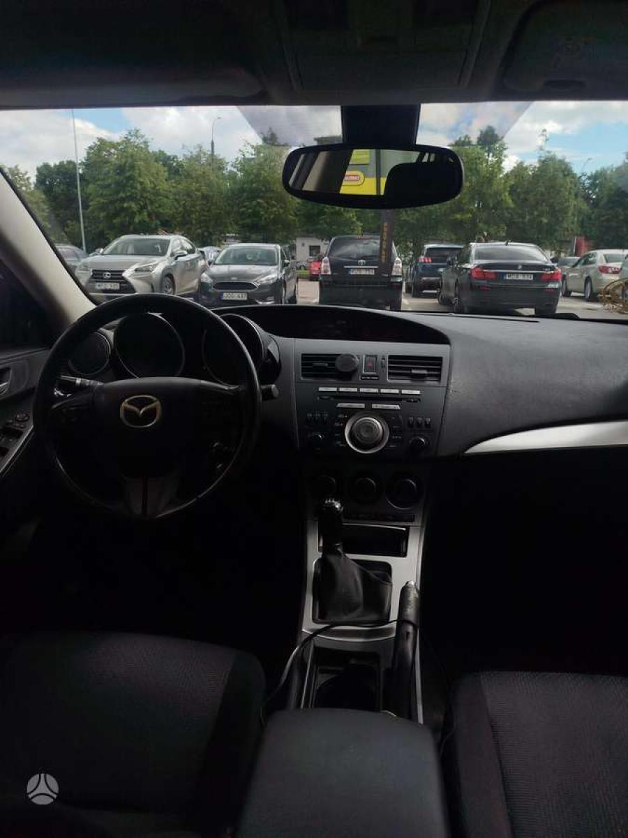 White Mazda 3 2010 in Kaunas, with an engine capacity of 1.56 L and mileage of 315 thousand km for 2400 €, photo 9 on AUTOMOTO.COM.LV