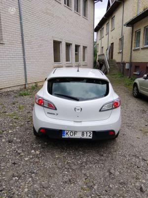 White Mazda 3 2010 in Panevezys, with an engine capacity of 1.60 L and mileage of 256 thousand km for 1450 €, photo 4 on AUTOMOTO.COM.LV