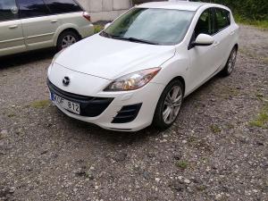 White Mazda 3 2010 in Panevezys, with an engine capacity of 1.60 L and mileage of 256 thousand km for 1450 €, photo 5 on AUTOMOTO.COM.LV