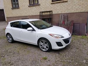 White Mazda 3 2010 in Panevezys, with an engine capacity of 1.60 L and mileage of 256 thousand km for 1450 €, photo 6 on AUTOMOTO.COM.LV