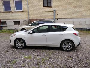 White Mazda 3 2010 in Panevezys, with an engine capacity of 1.60 L and mileage of 256 thousand km for 1450 €, photo 9 on AUTOMOTO.COM.LV
