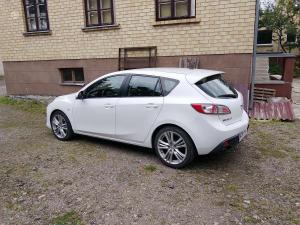 White Mazda 3 2010 in Panevezys, with an engine capacity of 1.60 L and mileage of 256 thousand km for 1450 €, photo 11 on AUTOMOTO.COM.LV