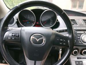 White Mazda 3 2010 in Panevezys, with an engine capacity of 1.60 L and mileage of 256 thousand km for 1450 €, photo 14 on AUTOMOTO.COM.LV