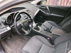 White Mazda 3 2010 in Panevezys, with an engine capacity of 1.60 L and mileage of 256 thousand km for 1450 €, photo 15 on AUTOMOTO.COM.LV