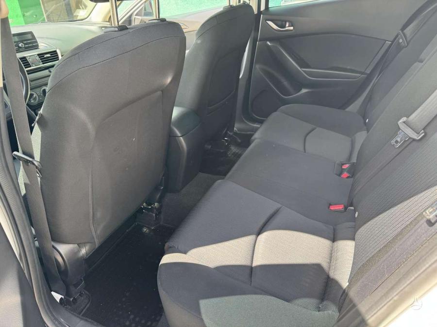 White Mazda 3 2014 in Kaunas, with an engine capacity of 1.50 L and mileage of 170 thousand km for 4500 €, photo 13 on AUTOMOTO.COM.LV