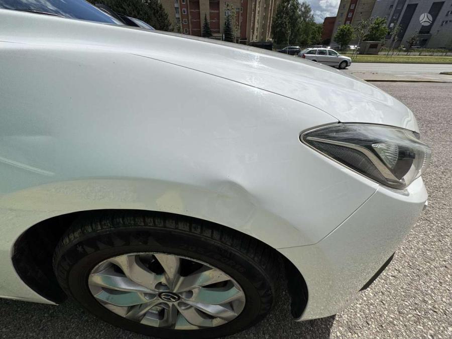 White Mazda 3 2014 in Kaunas, with an engine capacity of 1.50 L and mileage of 170 thousand km for 4500 €, photo 21 on AUTOMOTO.COM.LV