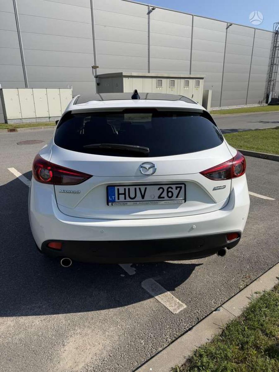 White Mazda 3 2015 in Klaipeda, with an engine capacity of 2.00 L and mileage of 179 thousand km for 9100 €, photo 6 on AUTOMOTO.COM.LV