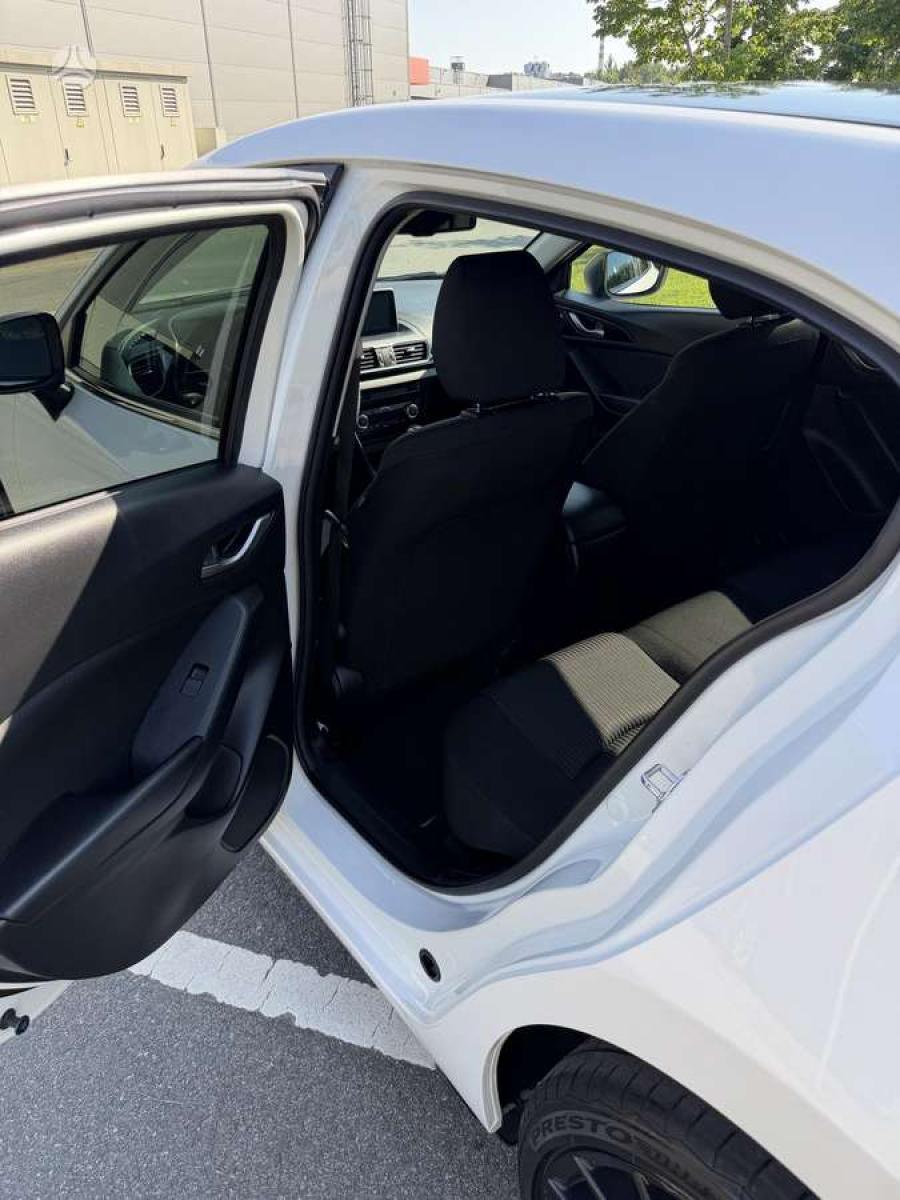 White Mazda 3 2015 in Klaipeda, with an engine capacity of 2.00 L and mileage of 179 thousand km for 9100 €, photo 12 on AUTOMOTO.COM.LV