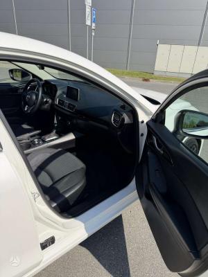 White Mazda 3 2015 in Klaipeda, with an engine capacity of 2.00 L and mileage of 179 thousand km for 9100 €, photo 15 on AUTOMOTO.COM.LV