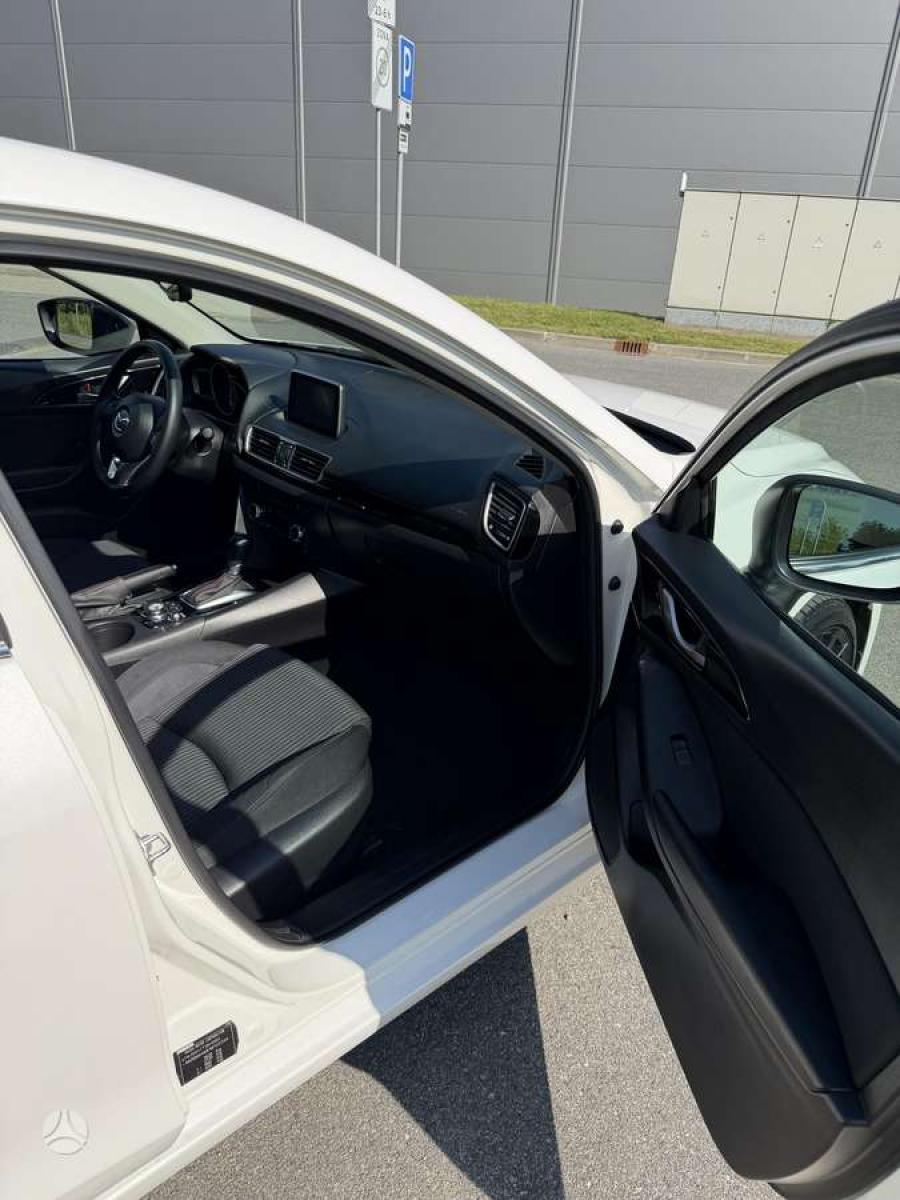 White Mazda 3 2015 in Klaipeda, with an engine capacity of 2.00 L and mileage of 179 thousand km for 9100 €, photo 15 on AUTOMOTO.COM.LV