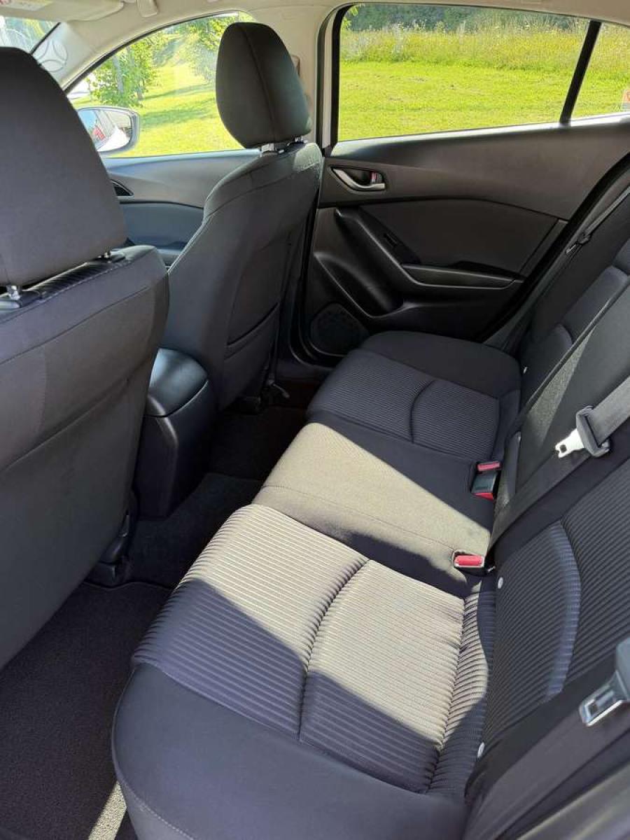 White Mazda 3 2015 in Klaipeda, with an engine capacity of 2.00 L and mileage of 179 thousand km for 9100 €, photo 17 on AUTOMOTO.COM.LV