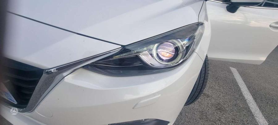 White Mazda 3 2016 in Taurage, with an engine capacity of 1.50 L and mileage of 171 thousand km for 4900 €, photo 14 on AUTOMOTO.COM.LV