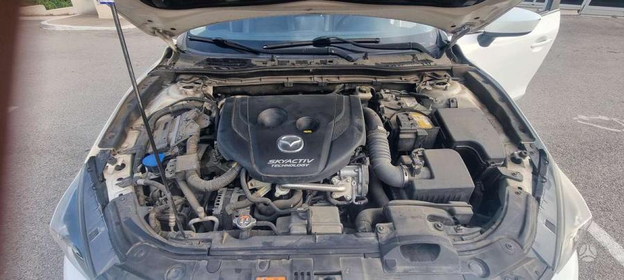 White Mazda 3 2016 in Taurage, with an engine capacity of 1.50 L and mileage of 171 thousand km for 4900 €, photo 22 on AUTOMOTO.COM.LV