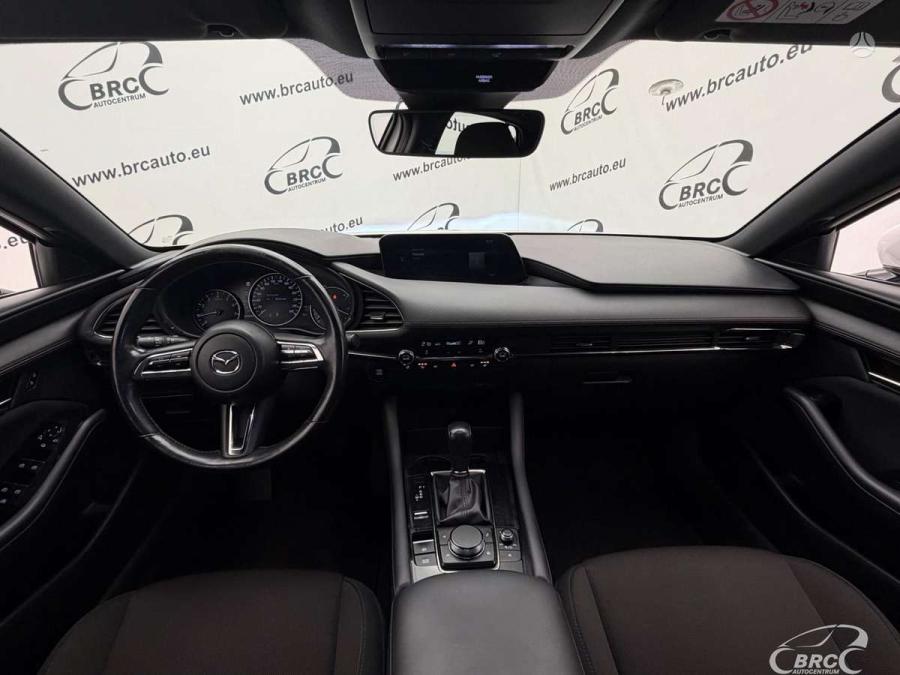 White Mazda 3 2021 in Vilnius, with an engine capacity of 2.00 L and mileage of 64 thousand km for 16999 €, photo 5 on AUTOMOTO.COM.LV