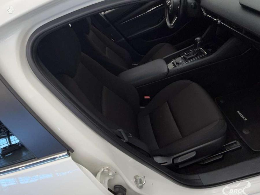 White Mazda 3 2021 in Vilnius, with an engine capacity of 2.00 L and mileage of 64 thousand km for 16999 €, photo 7 on AUTOMOTO.COM.LV