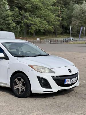White Mazda 3 2009 in Kaunas, with an engine capacity of 2.00 L and mileage of 242 thousand km for 2200 €, photo 3 on AUTOMOTO.COM.LV