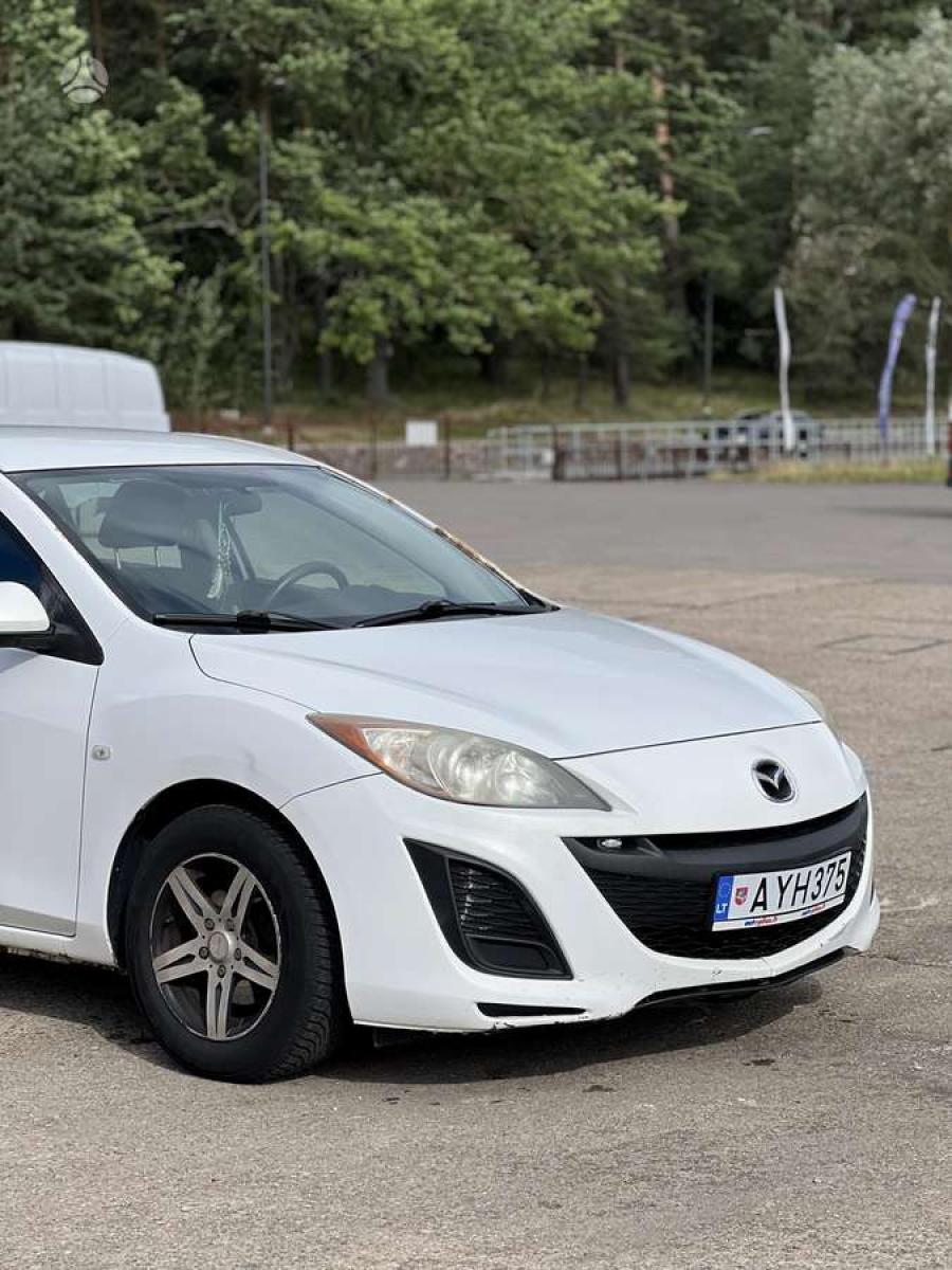 White Mazda 3 2009 in Kaunas, with an engine capacity of 2.00 L and mileage of 242 thousand km for 2200 €, photo 3 on AUTOMOTO.COM.LV