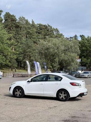 White Mazda 3 2009 in Kaunas, with an engine capacity of 2.00 L and mileage of 242 thousand km for 2200 €, photo 5 on AUTOMOTO.COM.LV