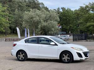 White Mazda 3 2009 in Kaunas, with an engine capacity of 2.00 L and mileage of 242 thousand km for 2200 €, photo 6 on AUTOMOTO.COM.LV