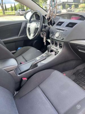 White Mazda 3 2009 in Kaunas, with an engine capacity of 2.00 L and mileage of 242 thousand km for 2200 €, photo 11 on AUTOMOTO.COM.LV