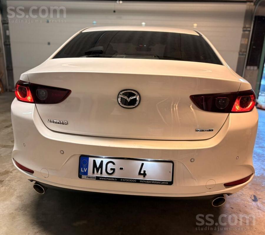 White Mazda 3 2020 in Riga, with an engine capacity of 2.00 L and mileage of 112 thousand km for 20500 €, photo 7 on AUTOMOTO.COM.LV