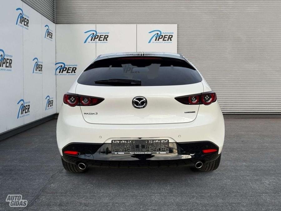 White Mazda 3 2021 in Kaunas, with an engine capacity of 2.00 L and mileage of 32 thousand km for 24307 €, photo 5 on AUTOMOTO.COM.LV