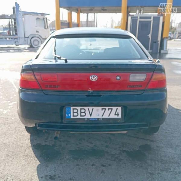 Zaļš Mazda 323 1994 Panevēža, ar dzinēja tilpumu 1.50 L un nobraukumu 206 tūkst. km par 1000 €, foto 4 vietnē AUTOMOTO.COM.LV