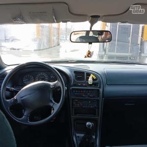 Zaļš Mazda 323 1994 Panevēža, ar dzinēja tilpumu 1.50 L un nobraukumu 206 tūkst. km par 1000 €, foto 8 vietnē AUTOMOTO.COM.LV