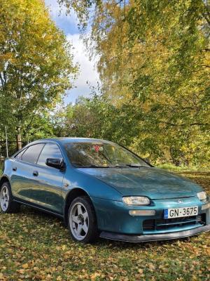 Green Mazda 323 1997 in Aluksne, with an engine capacity of 1.50 L and mileage of 291 thousand km for 1650 €, photo  on AUTOMOTO.COM.LV