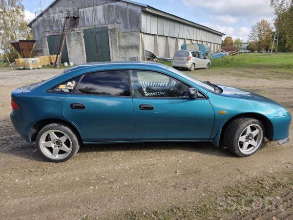 Green Mazda 323 1997 in Aluksne, with an engine capacity of 1.50 L and mileage of 291 thousand km for 1650 €, photo 7 on AUTOMOTO.COM.LV