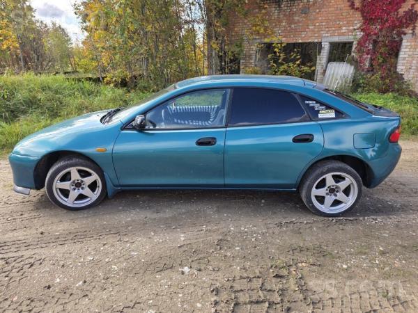 Green Mazda 323 1997 in Aluksne, with an engine capacity of 1.50 L and mileage of 291 thousand km for 1650 €, photo 8 on AUTOMOTO.COM.LV